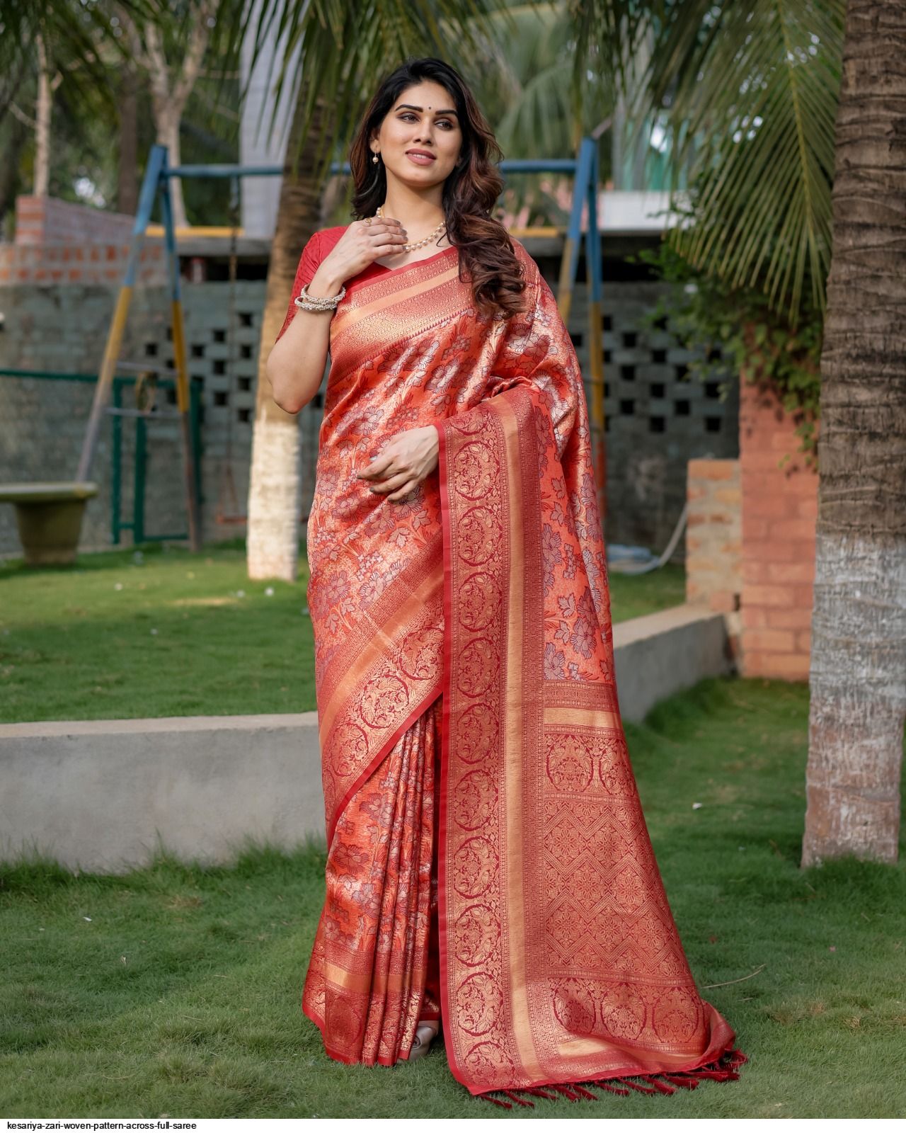 KESARIYA zari woven pattern across full Saree