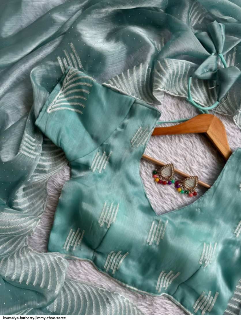 KOWSALYA Burberry jimmy Choo saree