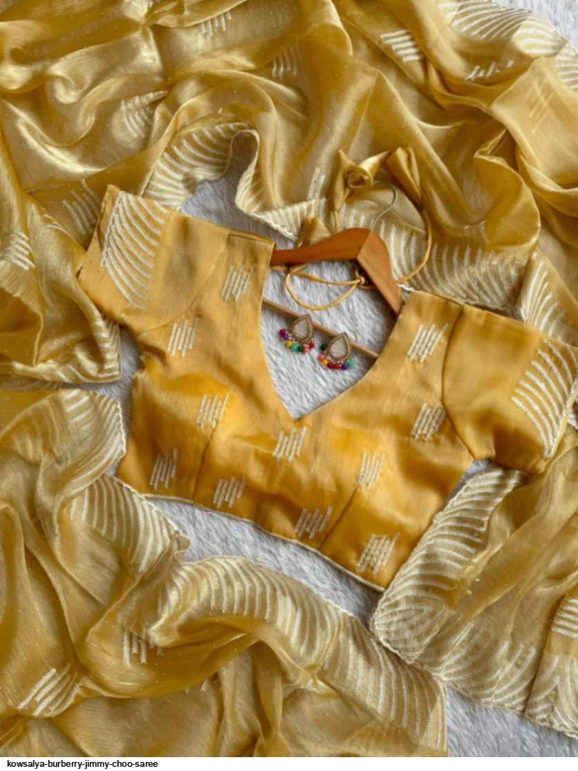 KOWSALYA Burberry jimmy Choo saree