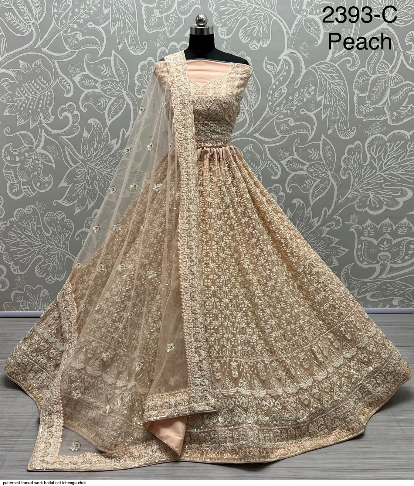Patterned thread work Bridal net lehenga choli